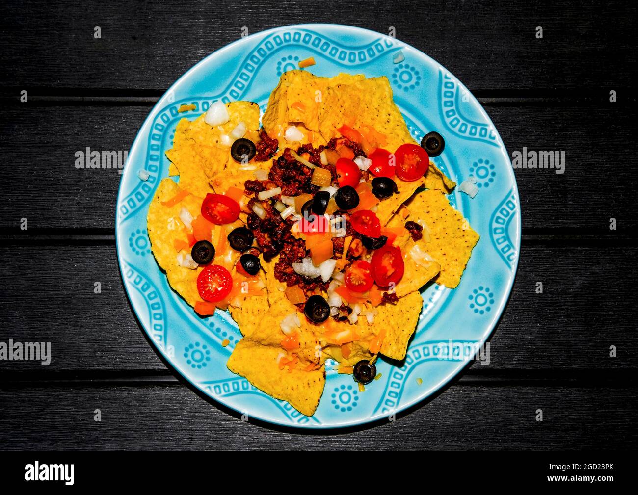 Simple beef nacho chips with chili and cheese Stock Photo - Alamy