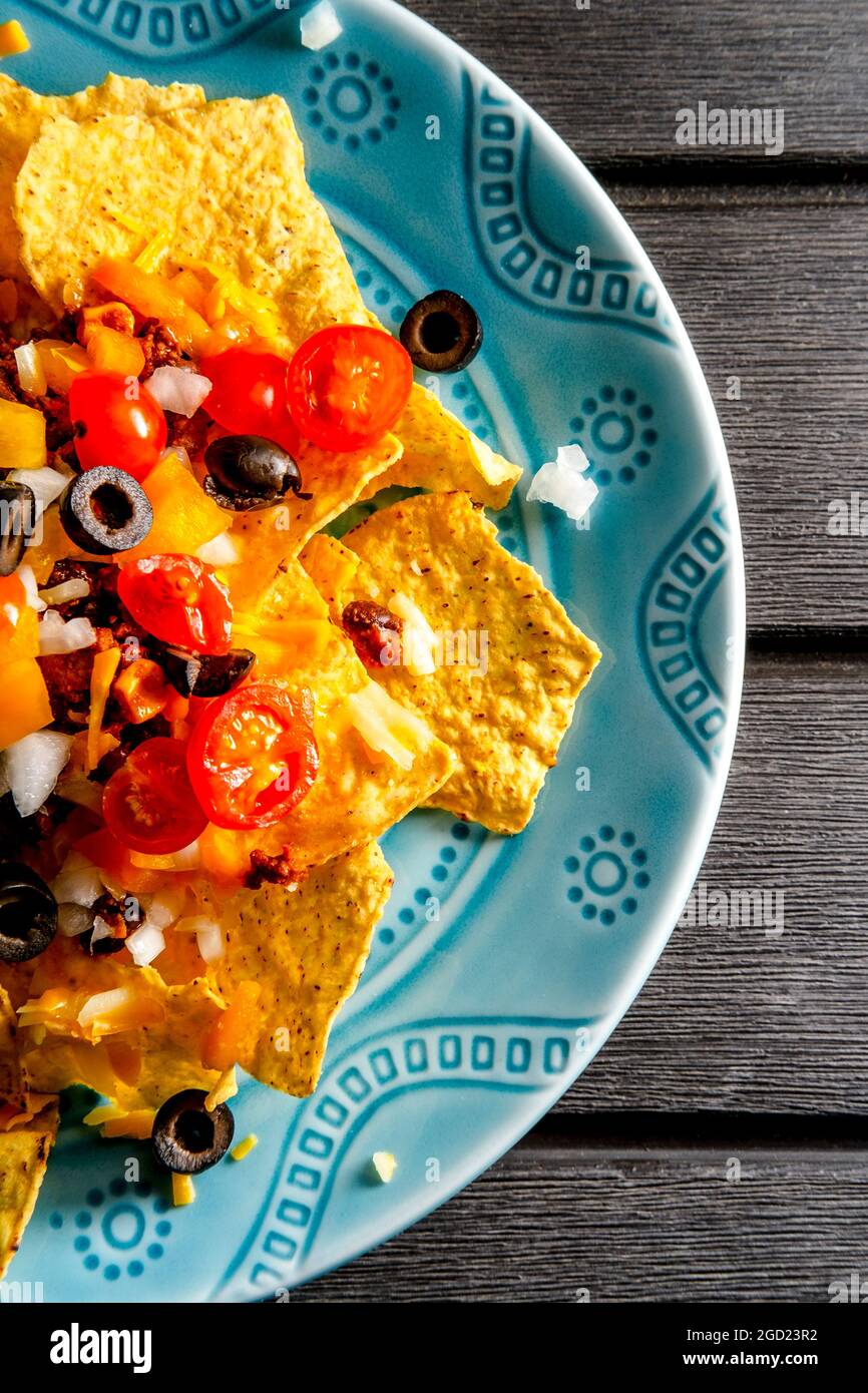 Simple beef nacho chips with chili and cheese Stock Photo - Alamy