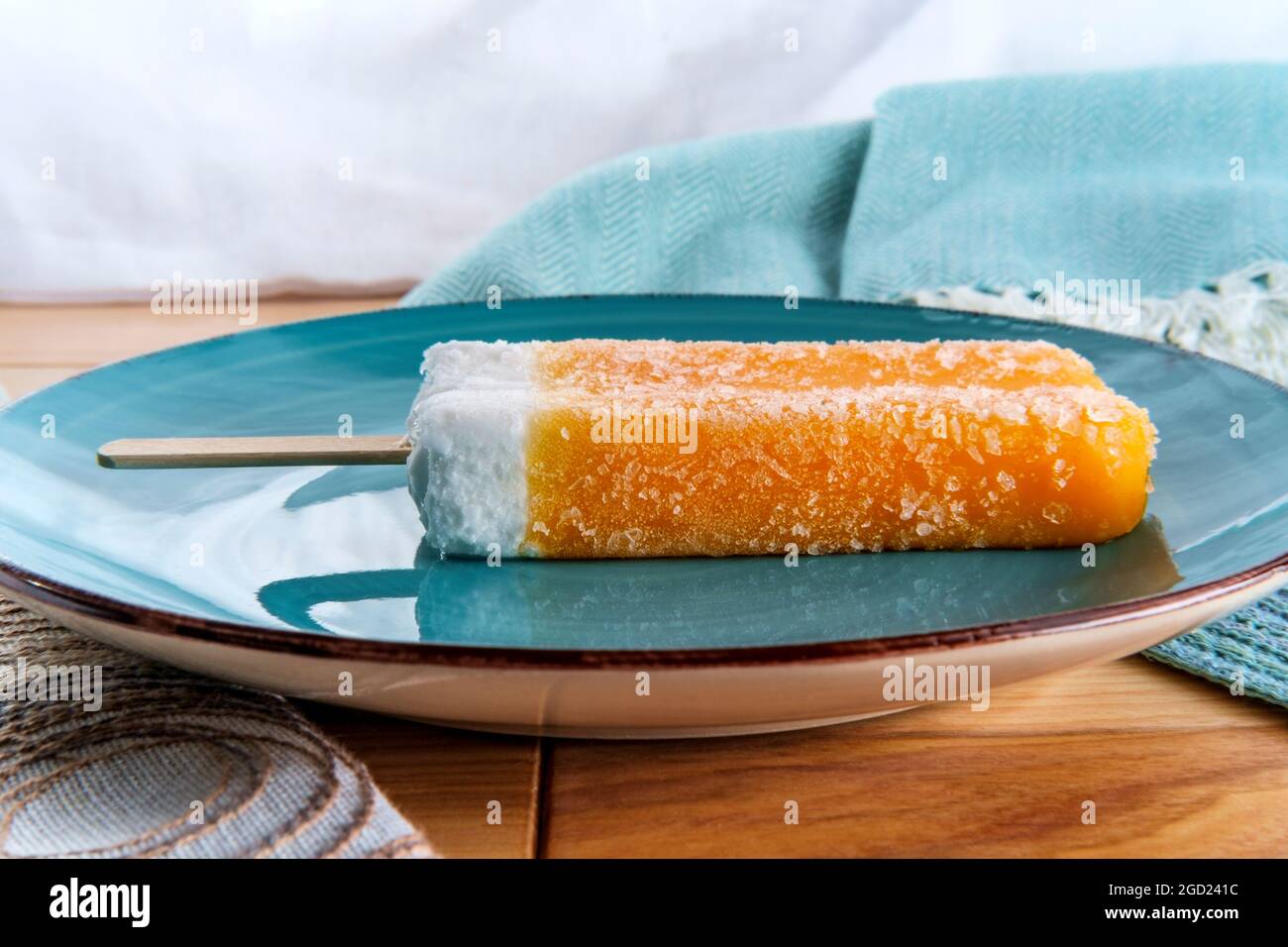 Refreshing frozen dessert Orange and cream ice pop on a stick Stock ...