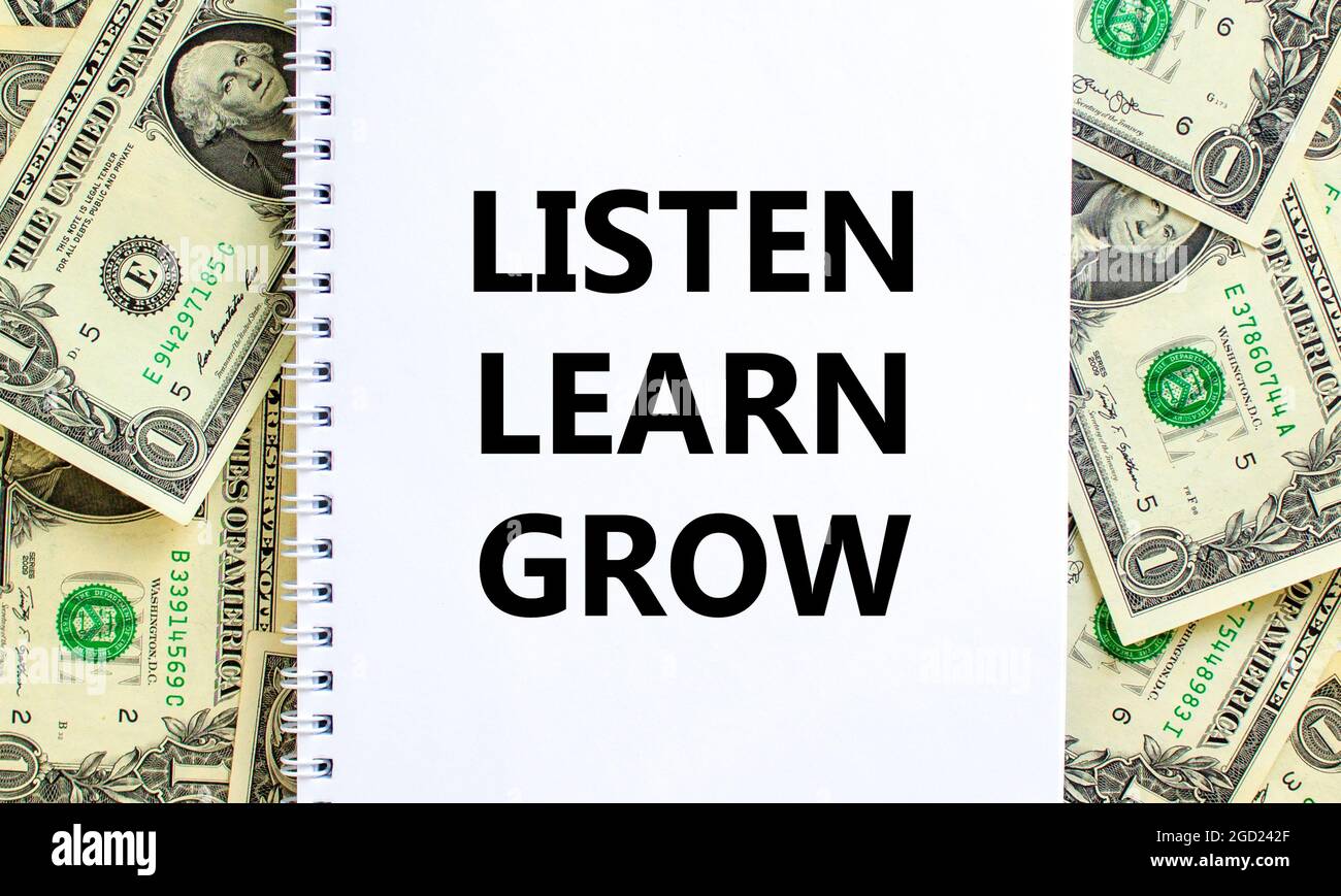 Listen, learn, grow symbol. Words 'Listen, learn, grow' on white note ...