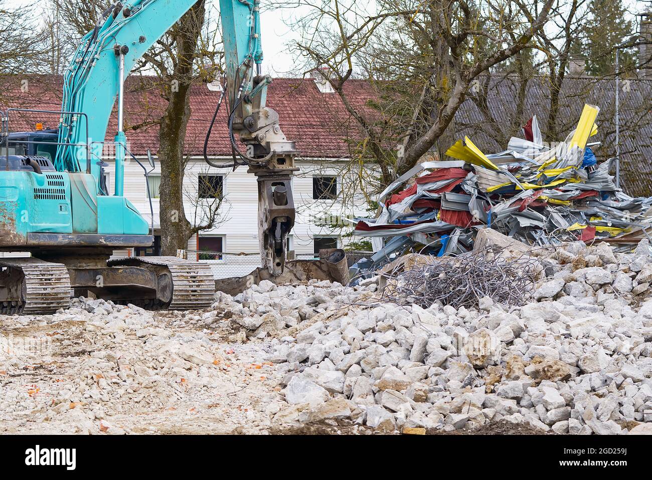 Old stone building demolition with excavator Stock Photo - Alamy