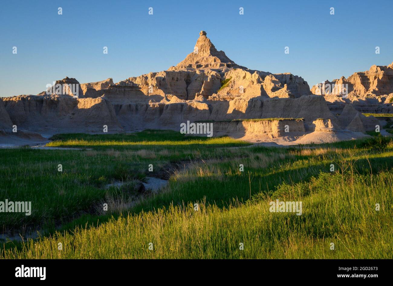 Grasslands and badlands spires, gullies and buttes at Window Trail in ...