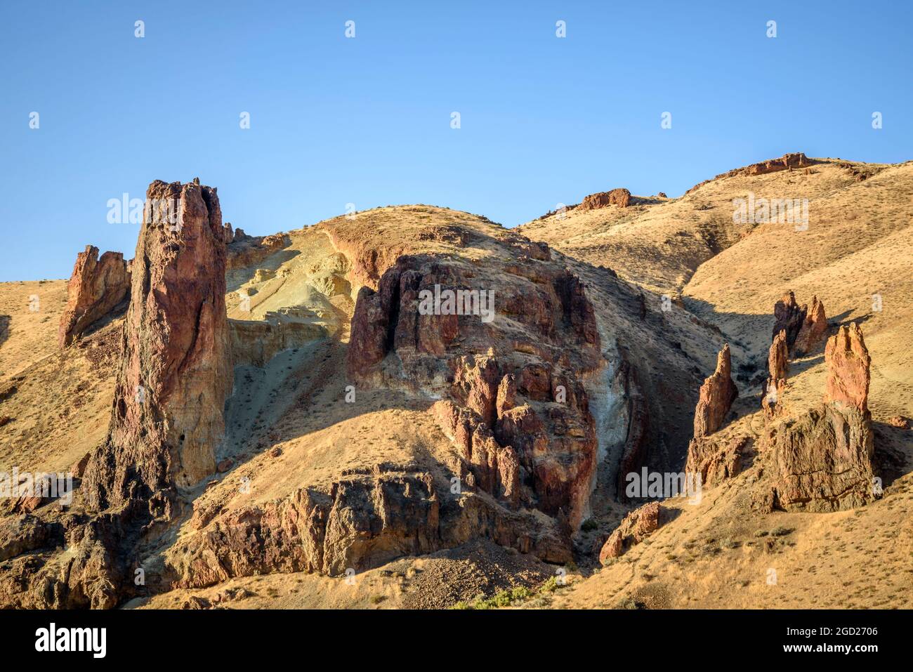 Rock formations of volcanic rhyolite ash-flow tuff showing differential ...