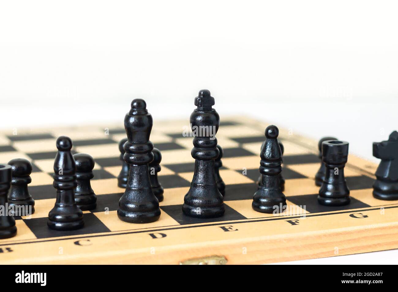 Black chess pieces or figures on game chessboard close-up Stock Photo ...