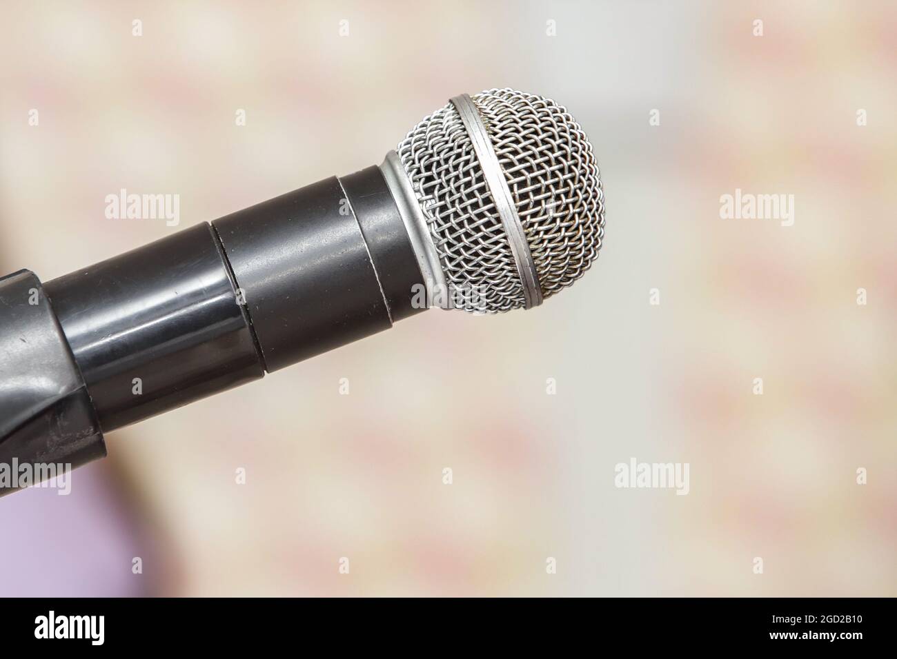 Highlight of an audio microphone at an event Stock Photo - Alamy