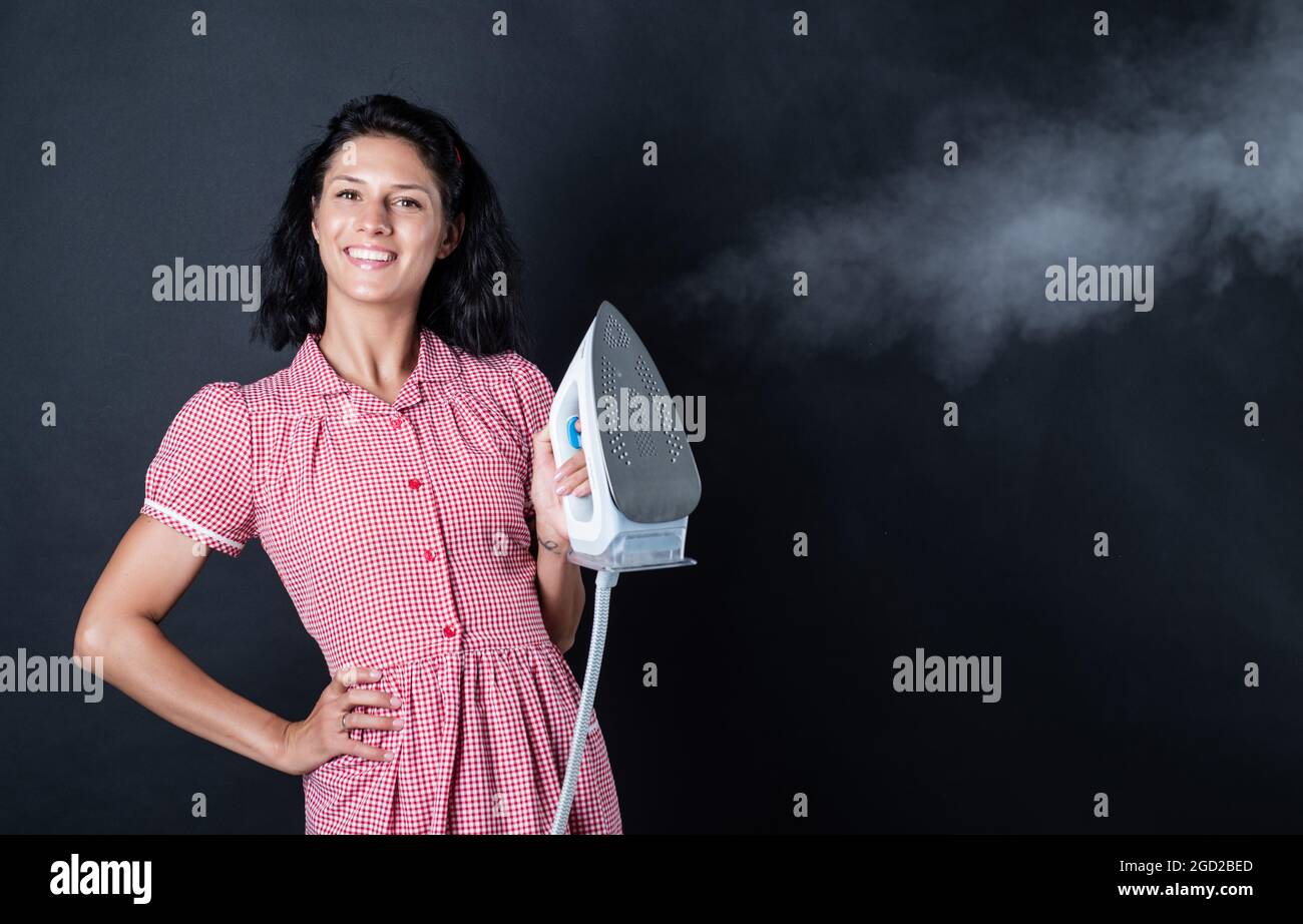 Iron for you. pinup girl prepare ironing. vintage lady hold modern iron ...