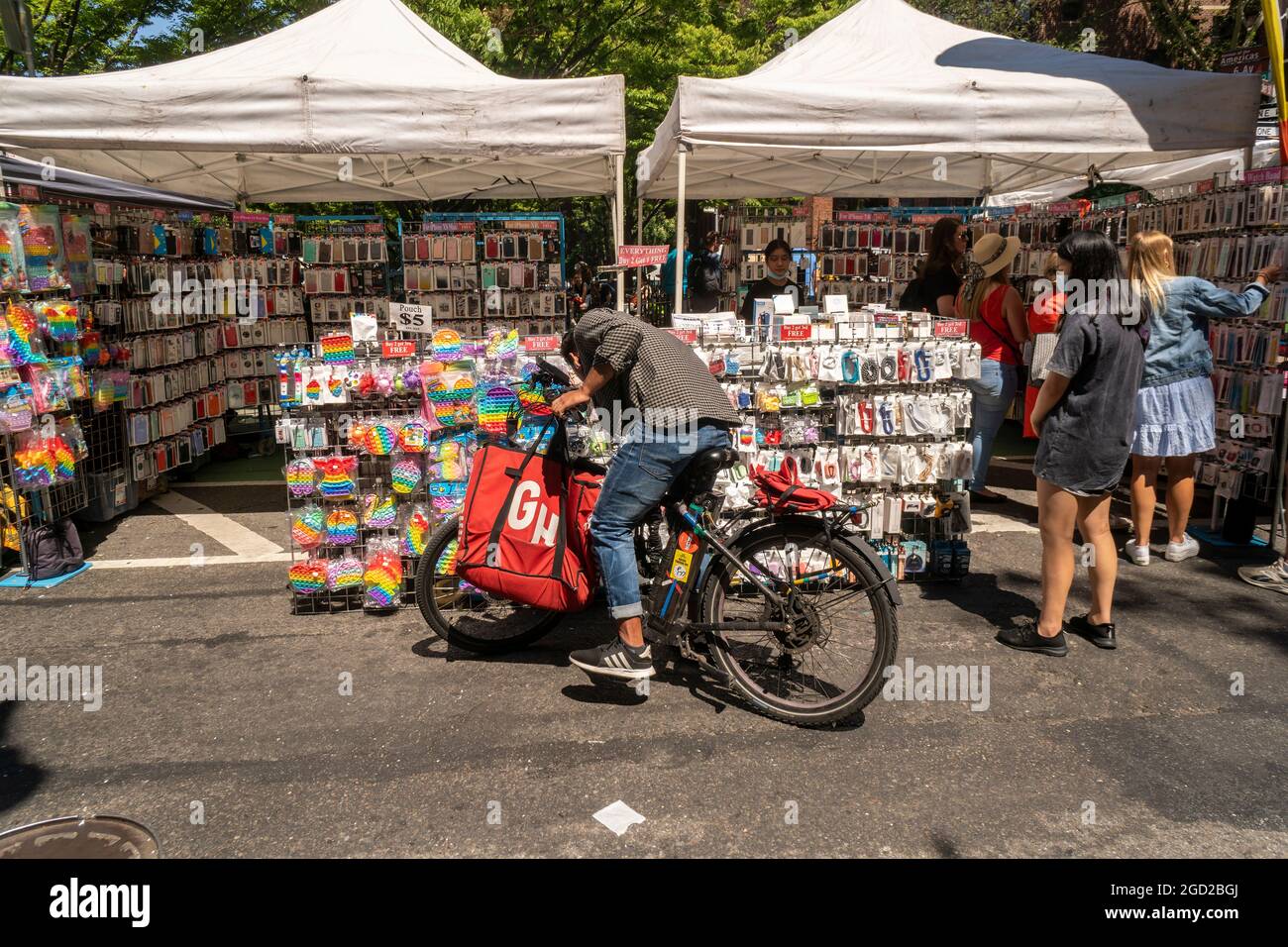 Shoppers and browsers at a street fair Greenwich Village in New York on ...