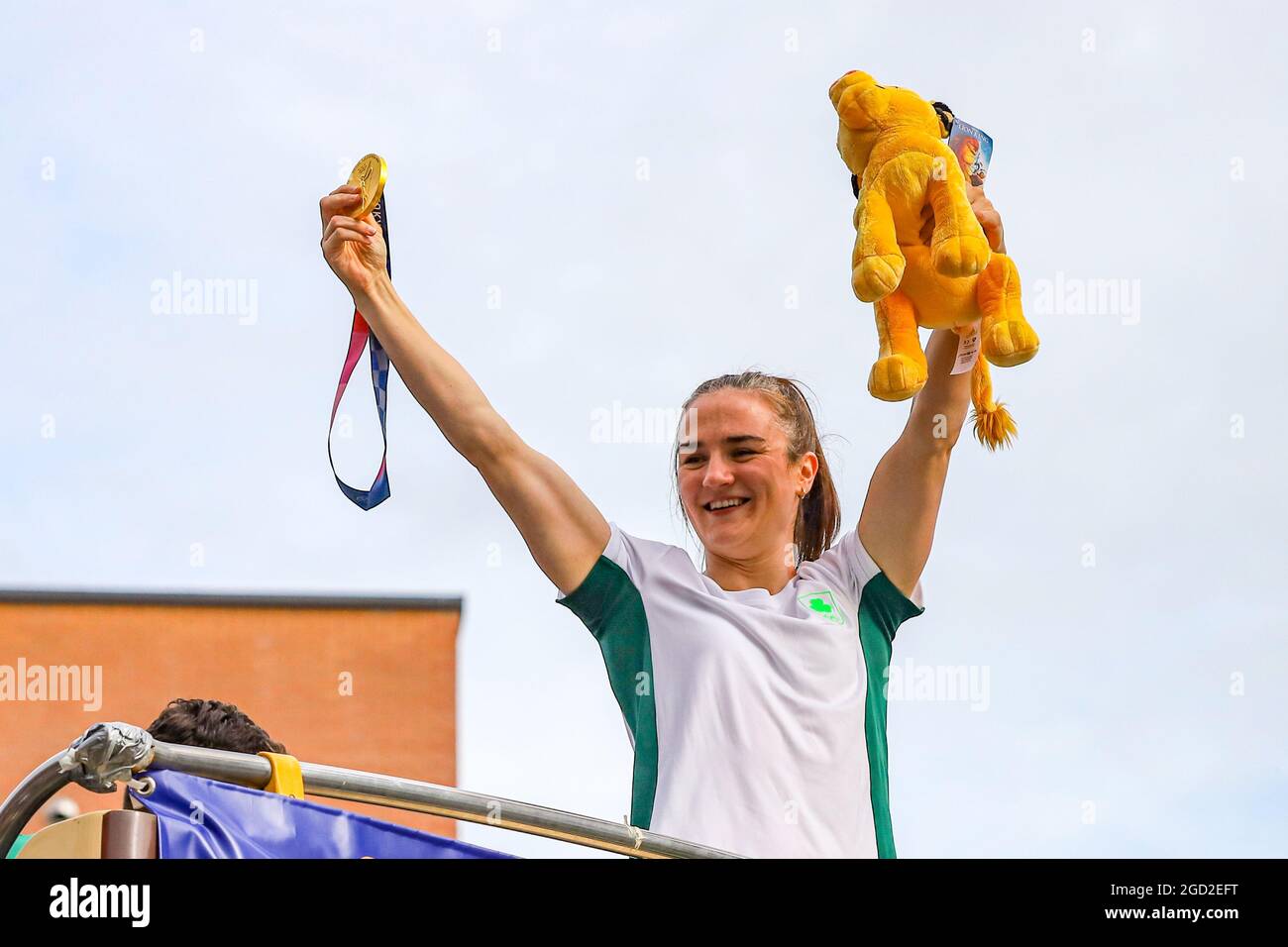 Kellie Harrington during an open top bus parade down her home street of ...