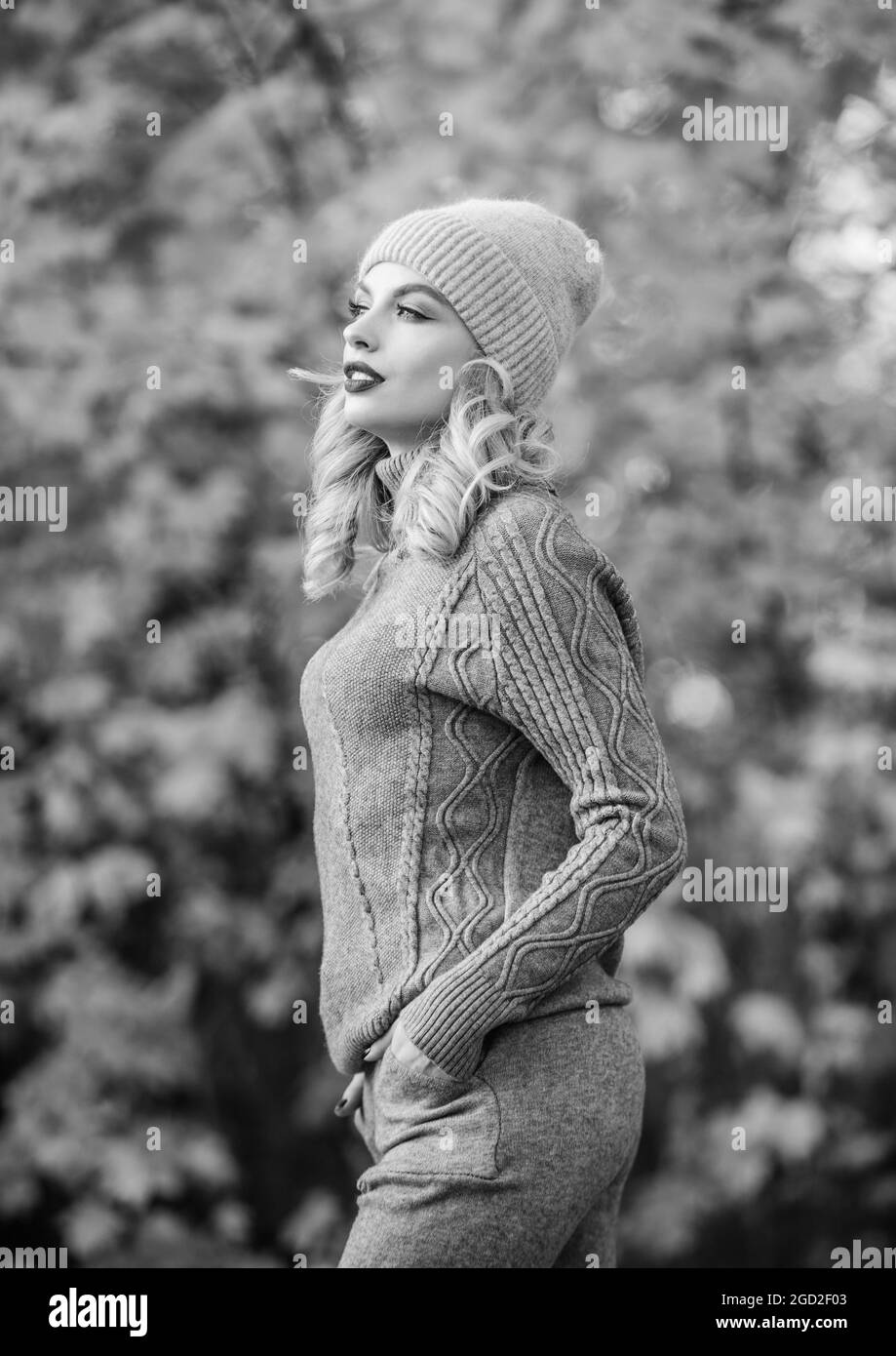 Woman enjoy autumn season in park. Warm knitwear. Feel practicality and ...