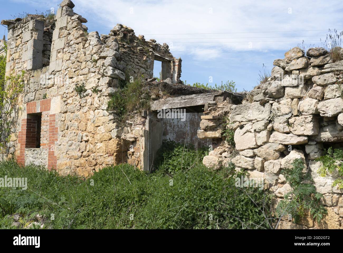 Beautiful facade of an old abandoned building with stone walls Stock ...