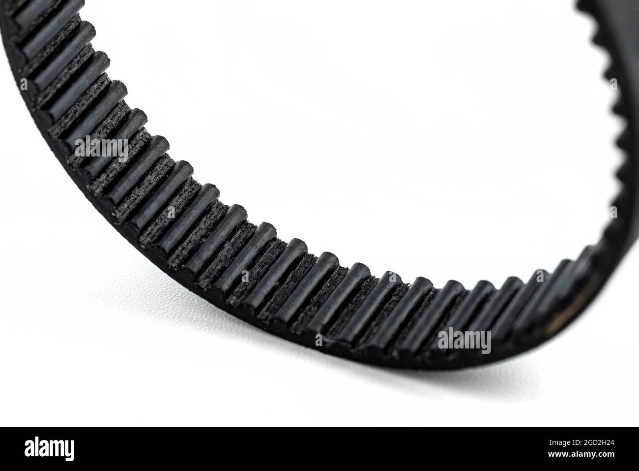 A macro photo of a toothed belt, isolated on a white background Stock ...