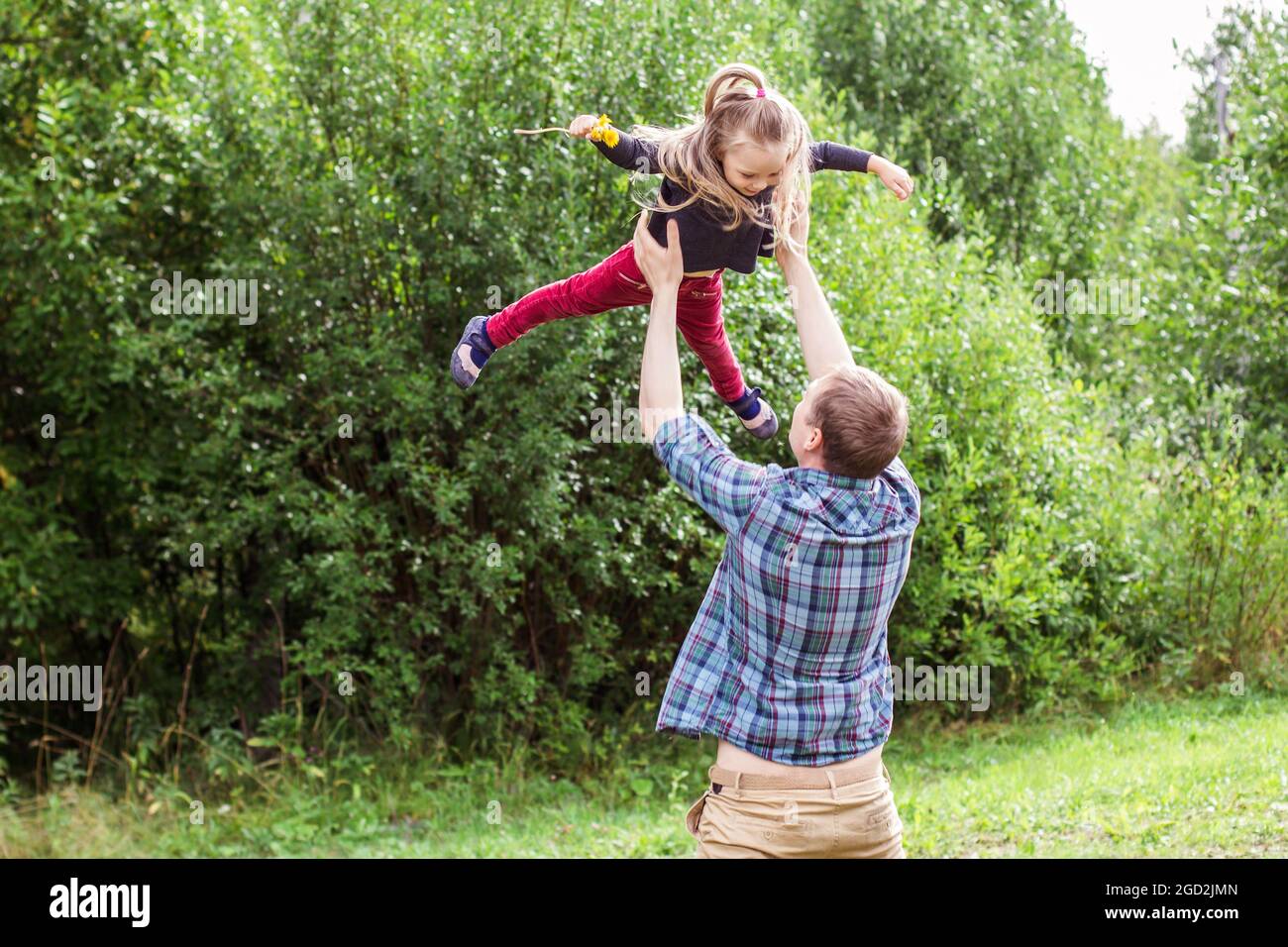 Father holding child in air hi-res stock photography and images - Alamy