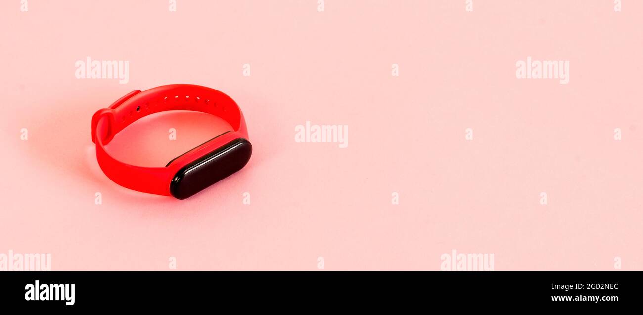 Smartwatch isolated on the pastel pink background Stock Photo - Alamy