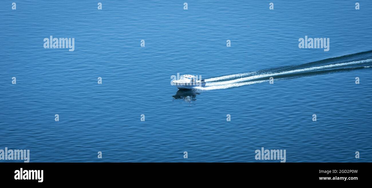Scenic view of a yacht floating in the sea Stock Photo - Alamy