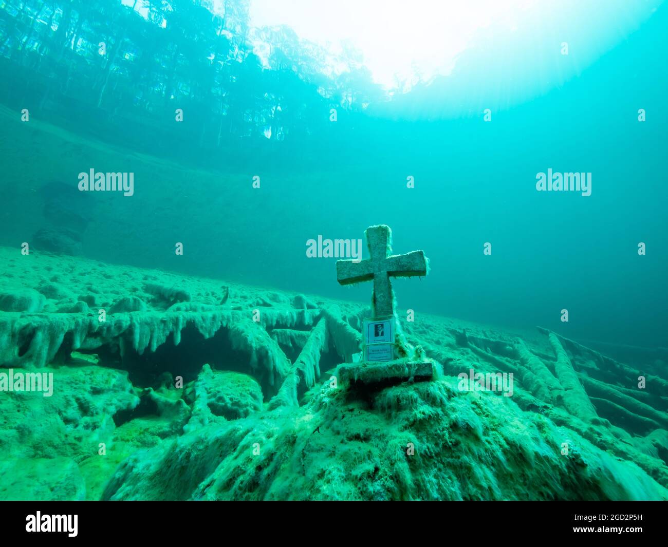 Stone cross underwater in a mountain lake, Good visibility, clear water ...