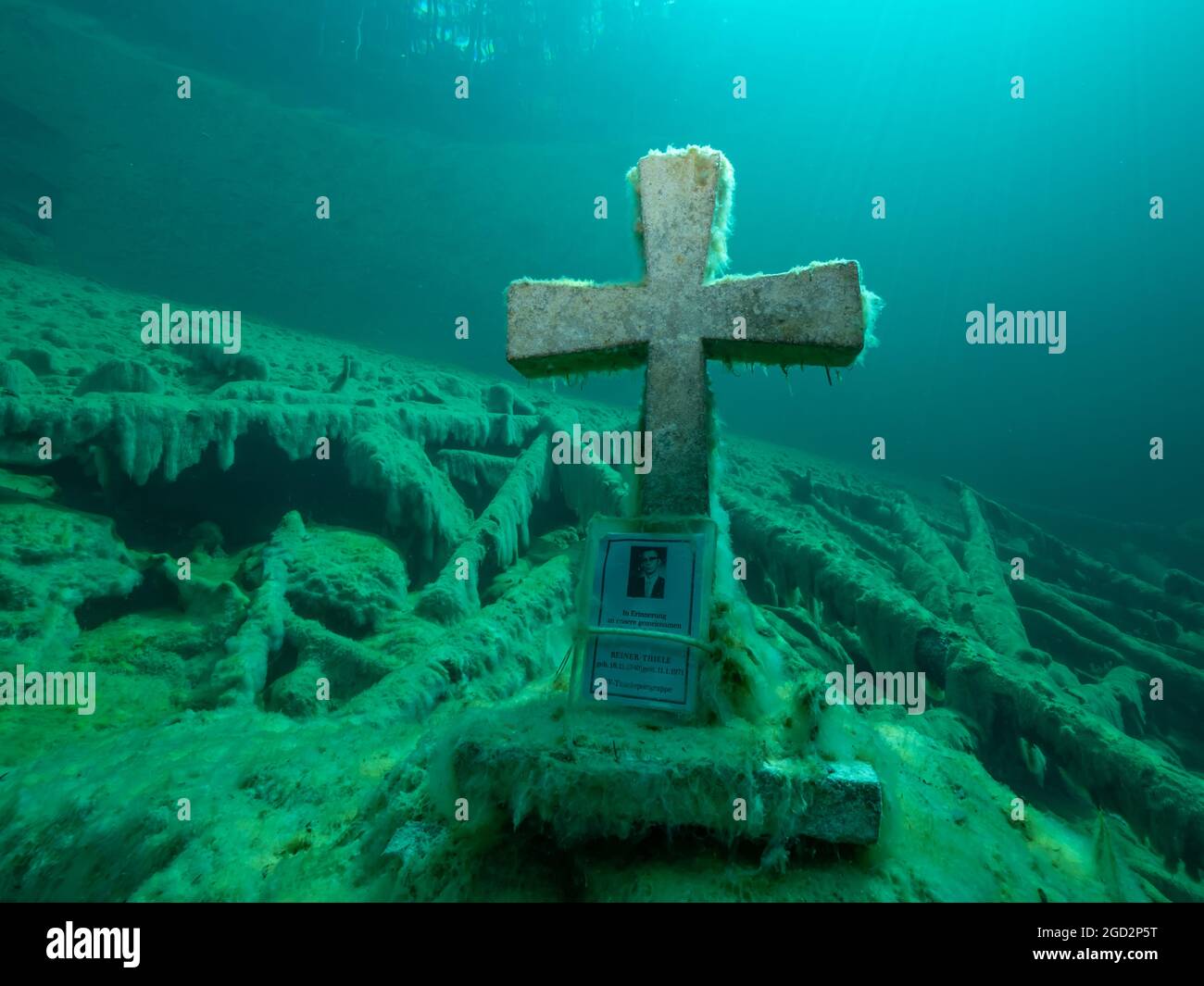 Stone cross underwater in a mountain lake, Good visibility, clear water ...
