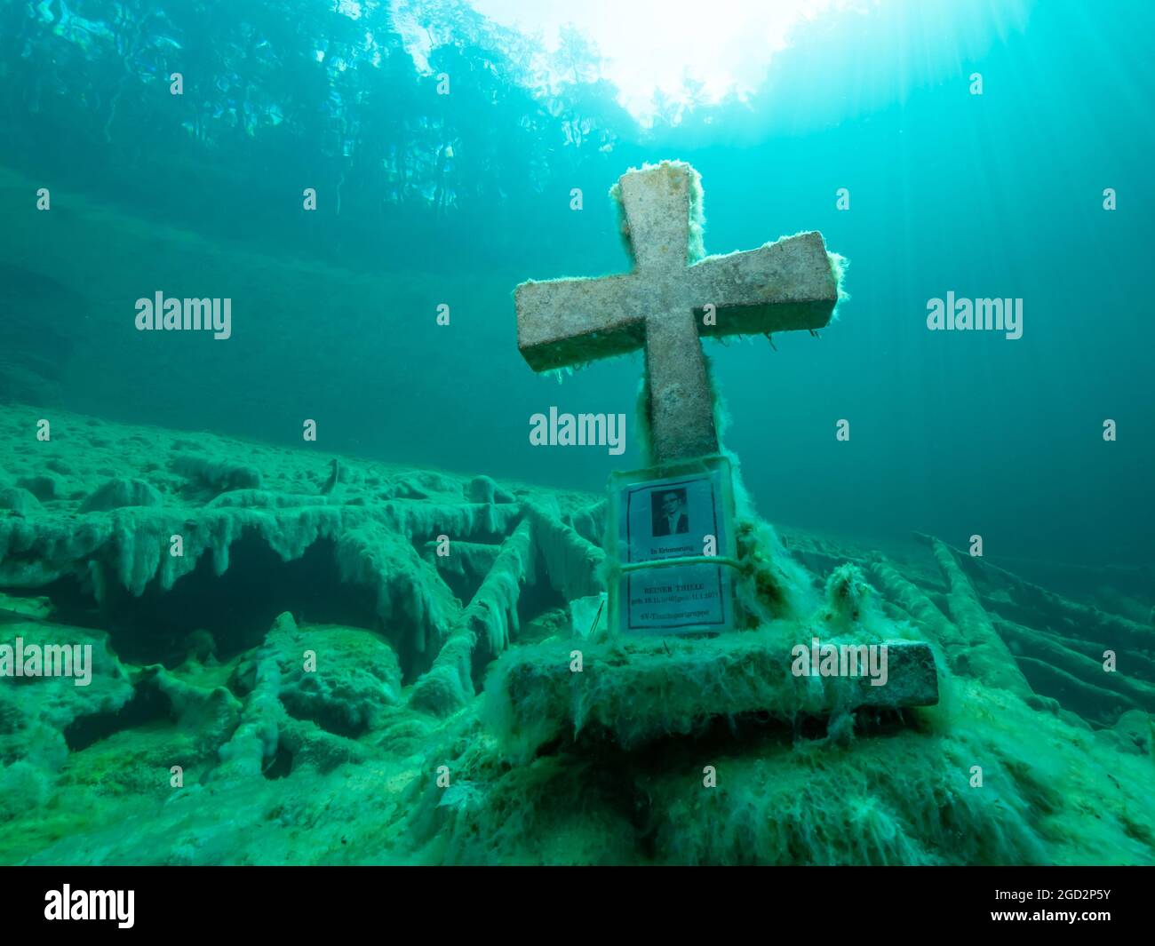 Stone cross underwater in a mountain lake, Good visibility, clear water ...