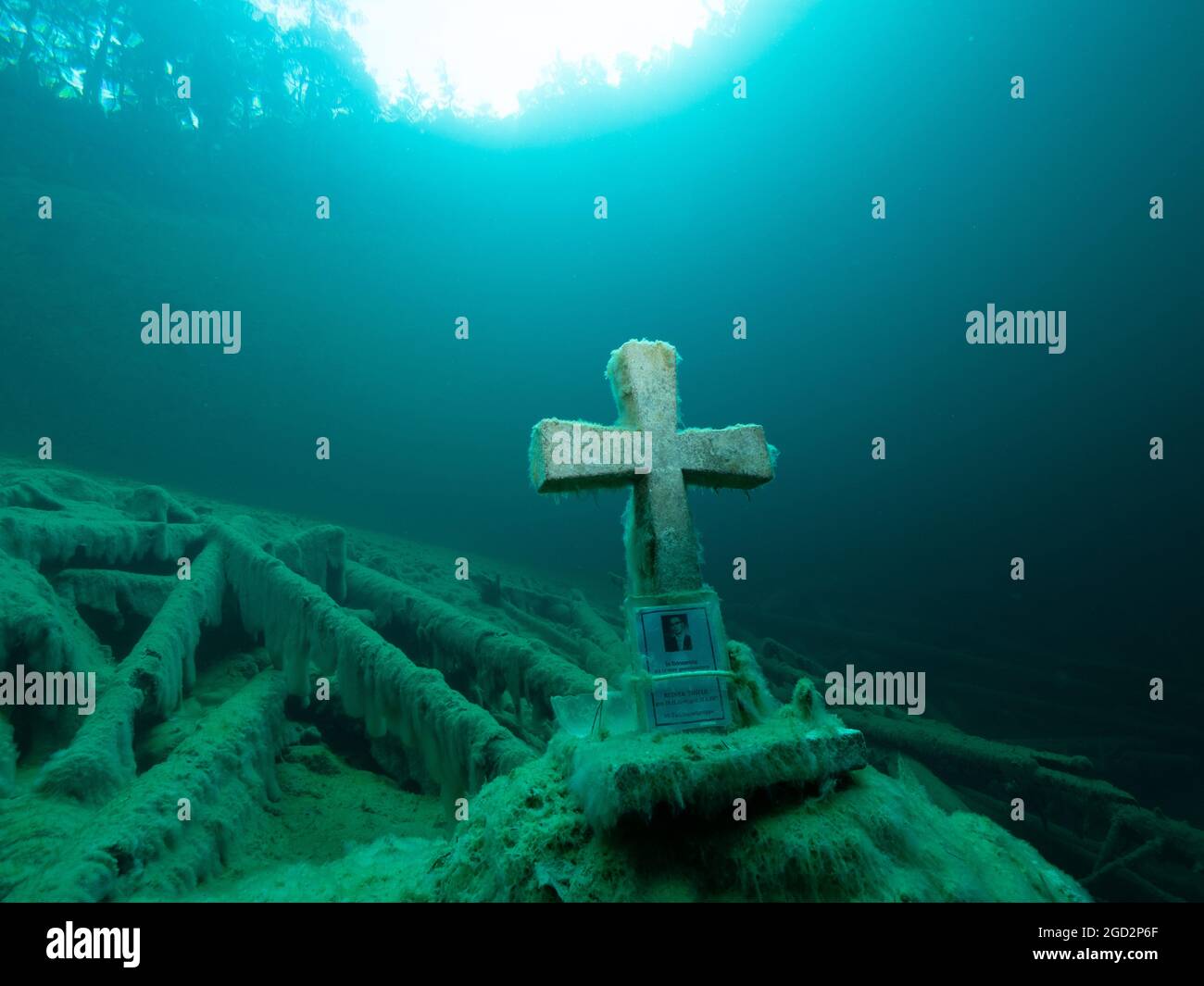 Stone cross underwater in a mountain lake, Good visibility, clear water ...