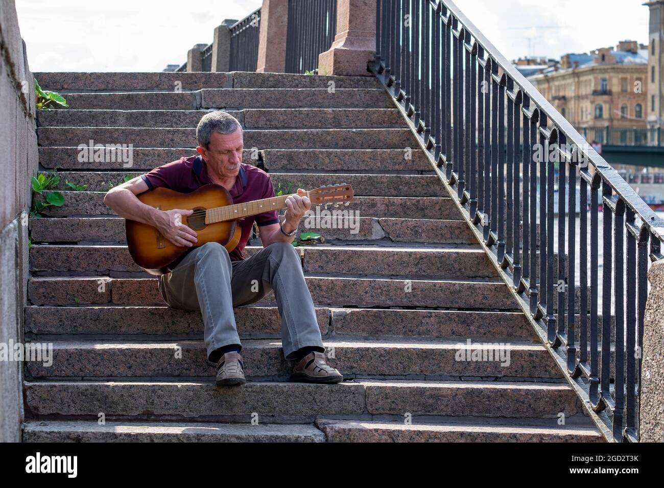 Old man plays instrument hi-res stock photography and images - Alamy