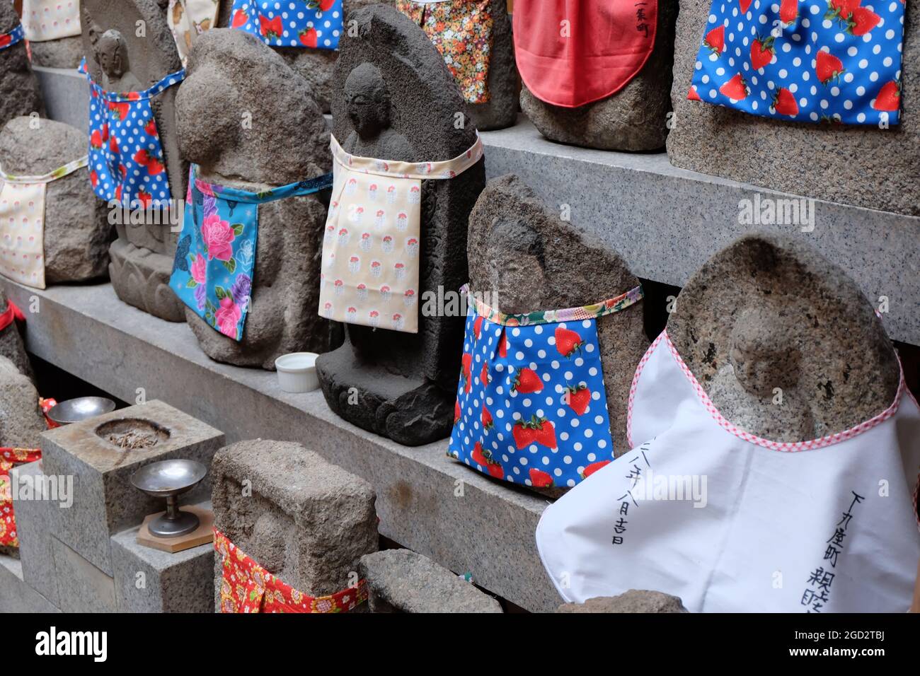 Japanese temple Gods dressed at Yata-dera Stock Photo - Alamy