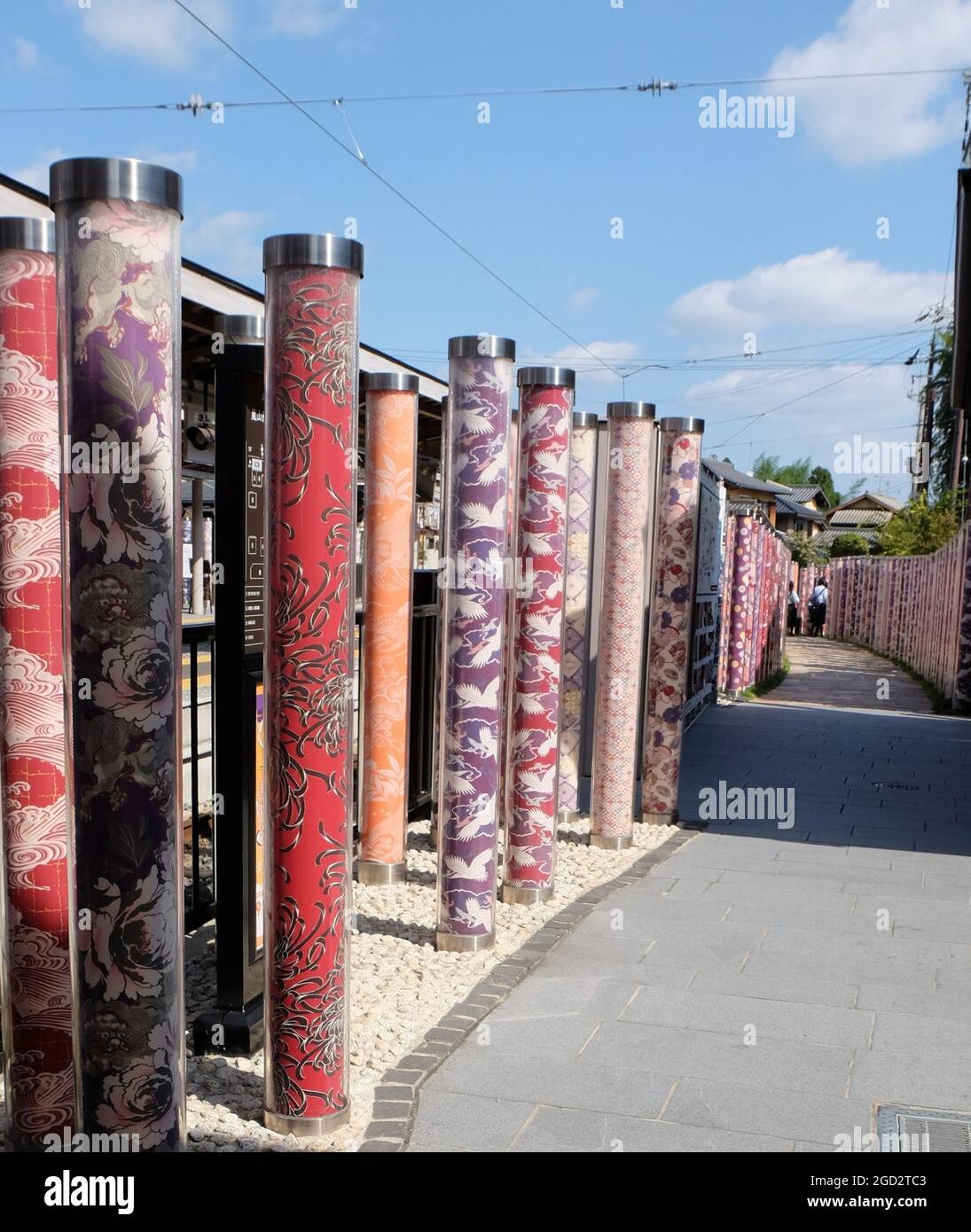 Kimono Forest pillars line Pathway at Arashymana station in Kyoto Stock ...