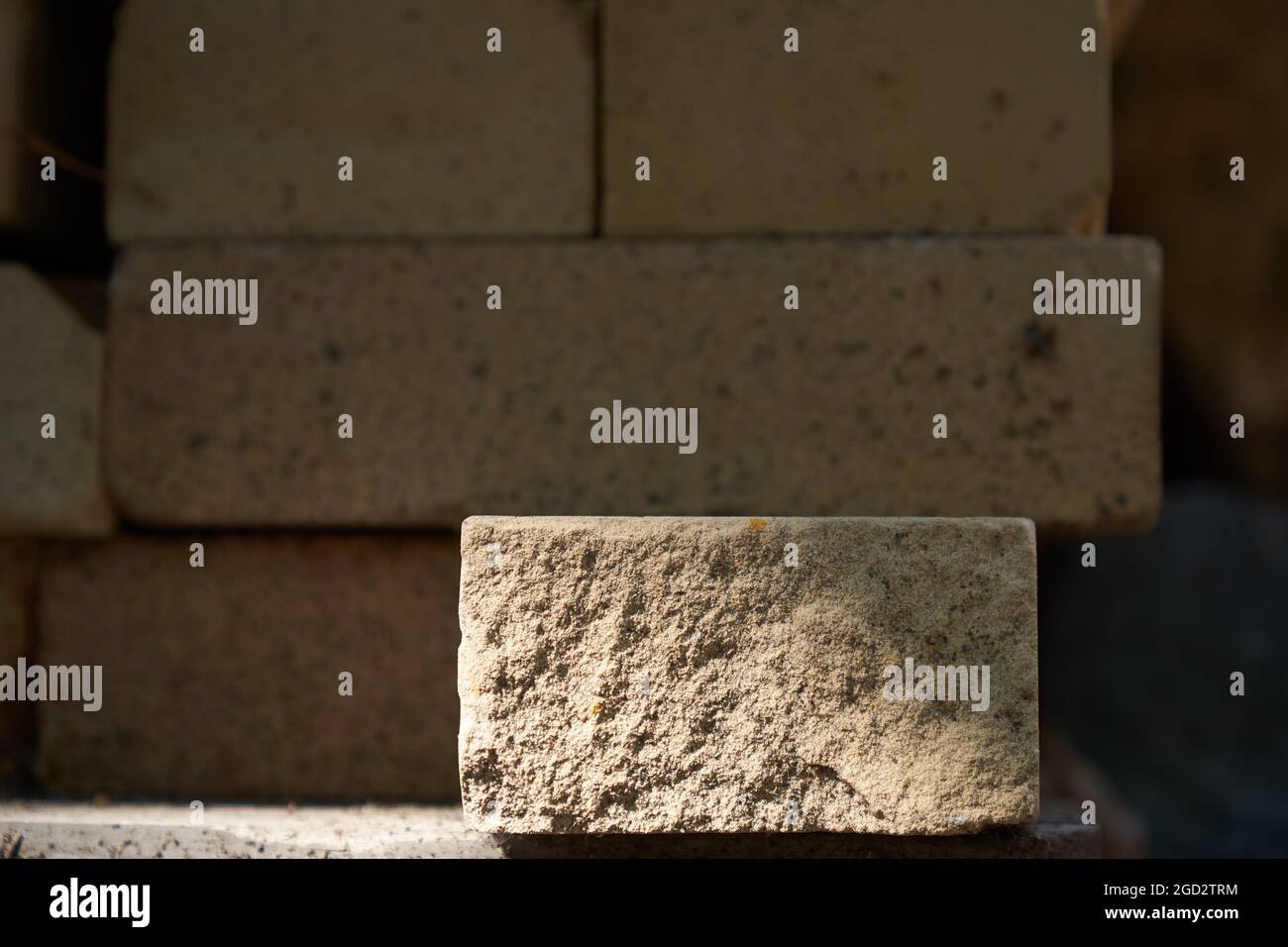 A podium made of rectangular beige stone to demonstrate your product on ...