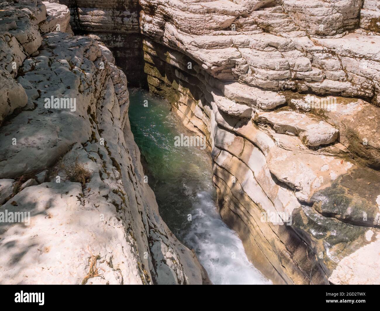 A river with clear water flows in narrow gorge between canyons Stock ...