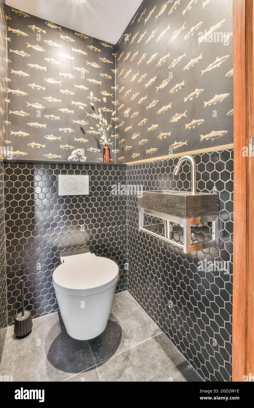 Interior of small clean washroom in miniature style Stock Photo - Alamy