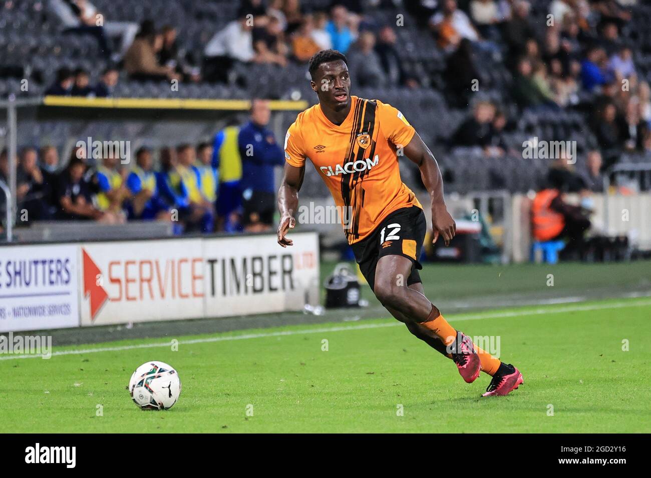 Josh Emmanuel #12 of Hull City looks for a target in the box Stock ...