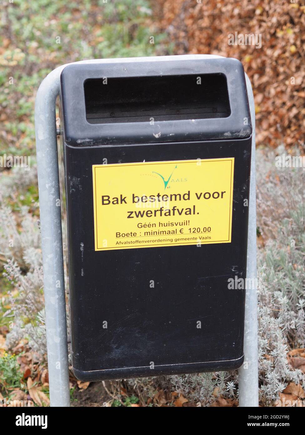 VAALS, NETHERLANDS - Jan 10, 2017: A trash bin with information sticker ...
