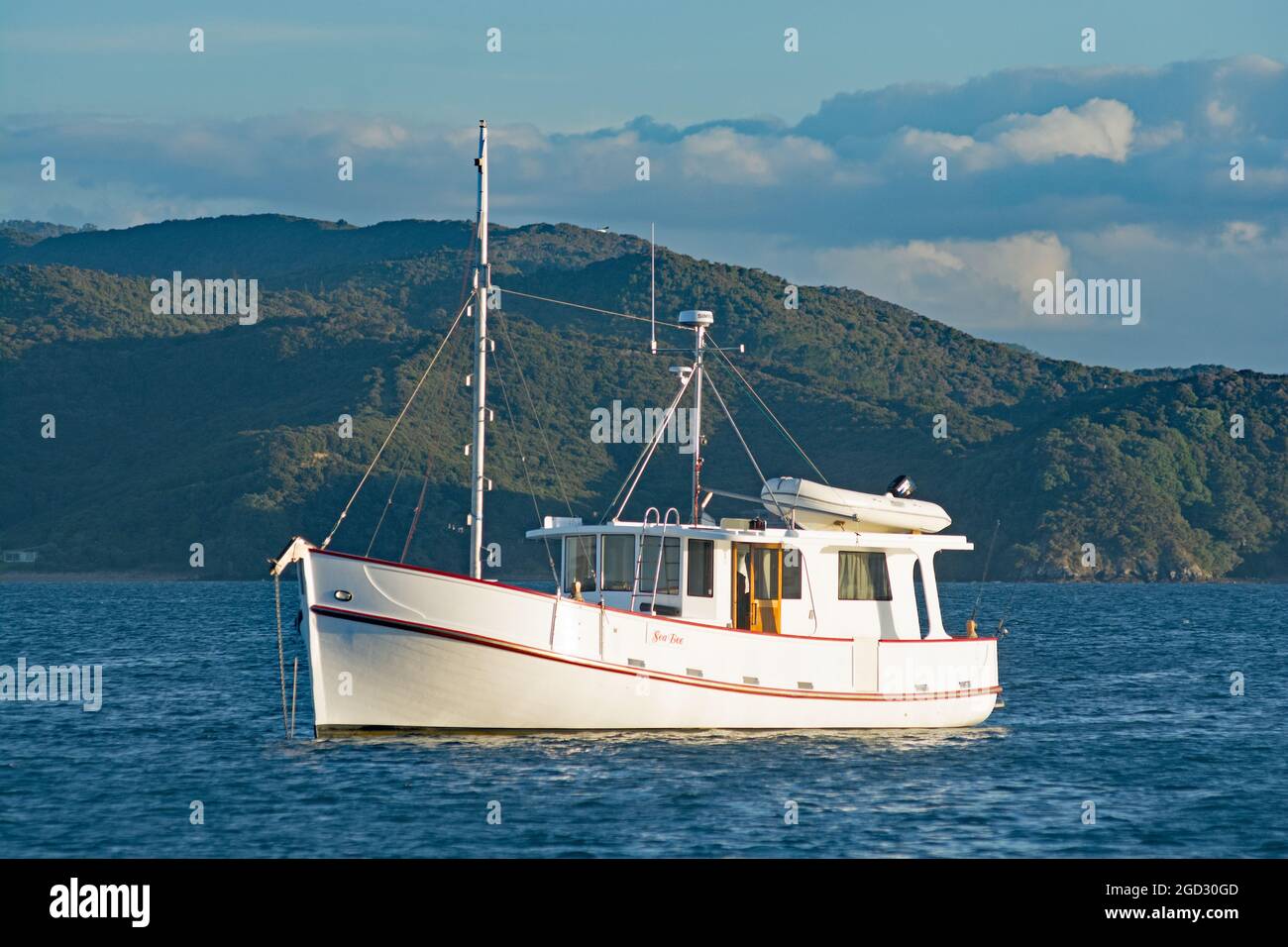 Classic Launch in Deep Water Cove Bay of Islands New Zealand Stock ...