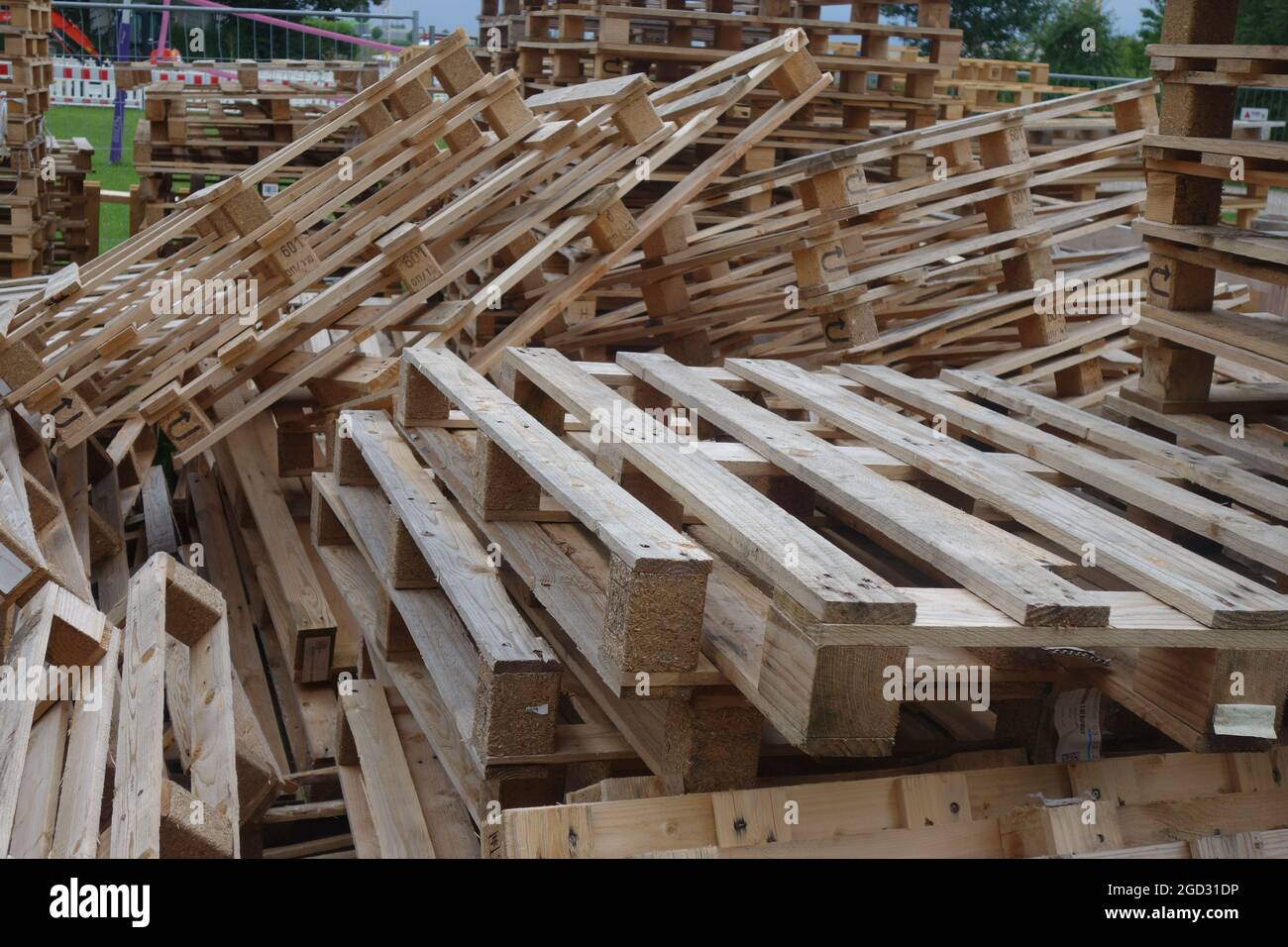 Shot of wooden pallets stacked on top of each other Stock Photo - Alamy