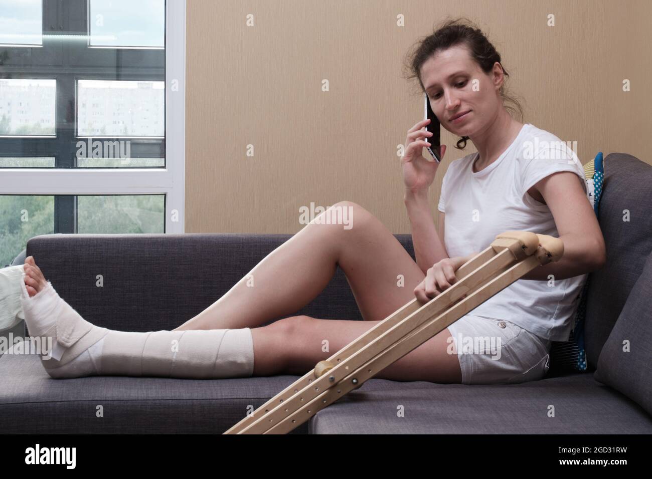 Woman Leg Cast Crutches In High Resolution Stock Photography and Images ...