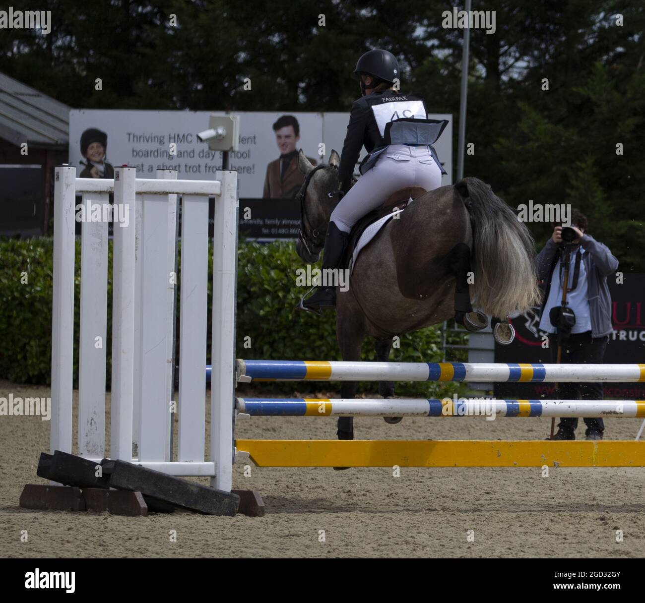 Back view of a horserider in a horse racing Stock Photo - Alamy