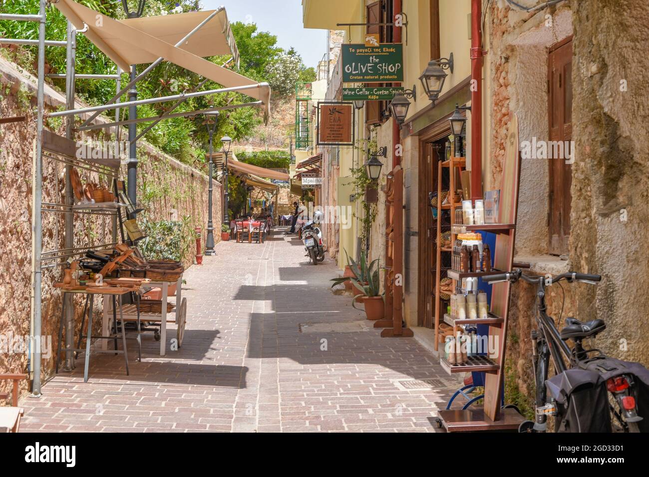 CHANIA, GREECE - Jul 01, 2021: The shops and cafes on the cozy narrow ...