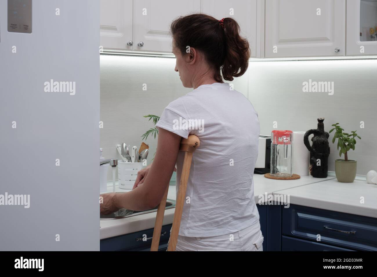 Woman Leg Cast Crutches In High Resolution Stock Photography and Images ...