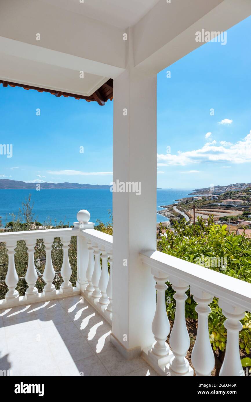 Classic Greek architecture white terrace balcony with balusters. View ...