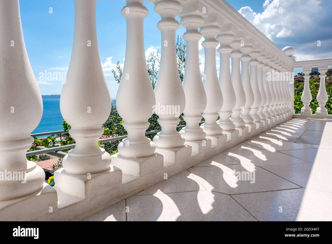 Traditional white balusters close-up. Greek architecture elements of ...