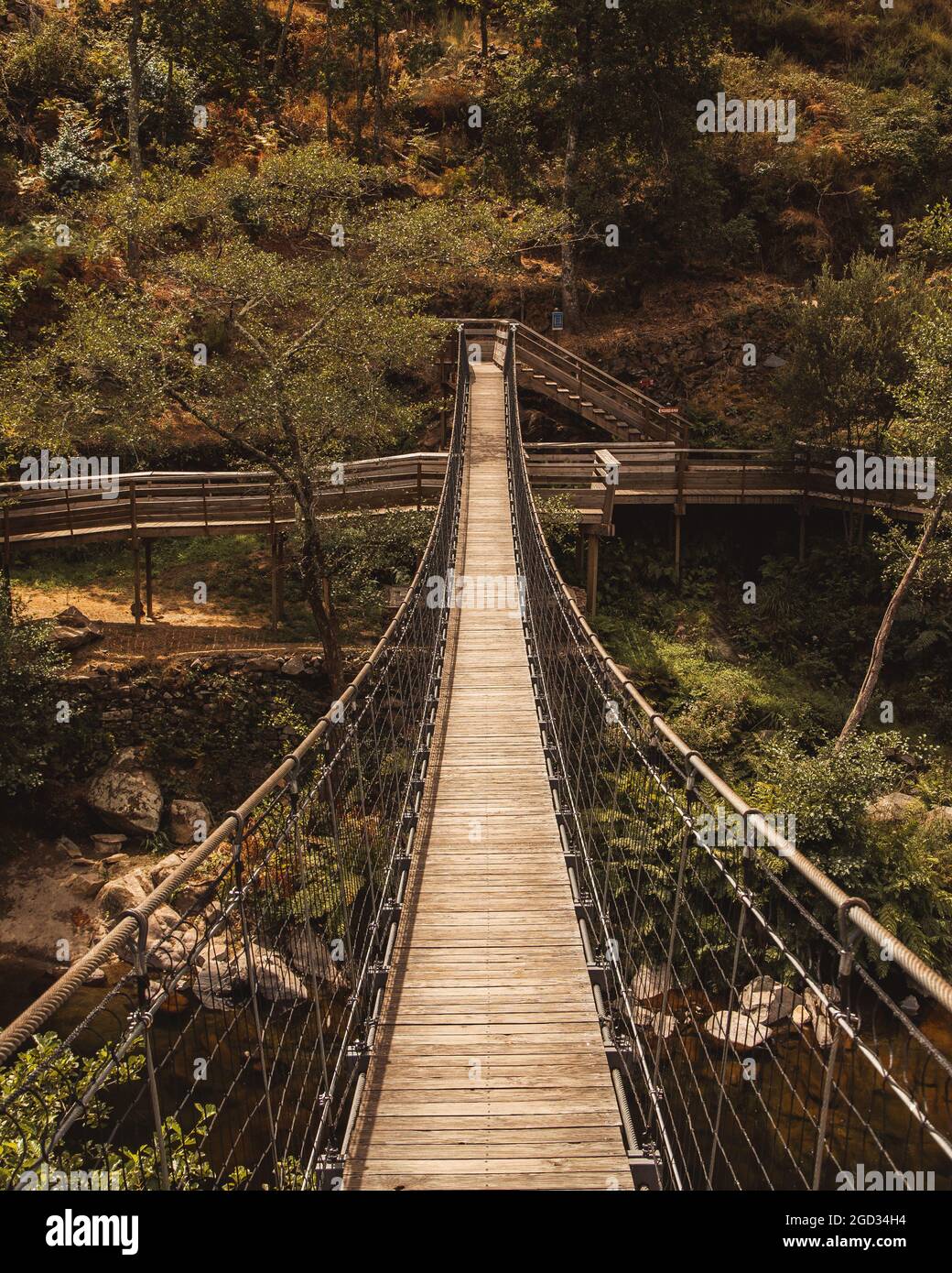 Wood Bridge between two mountains in Passadiços do Paiva Stock Photo ...