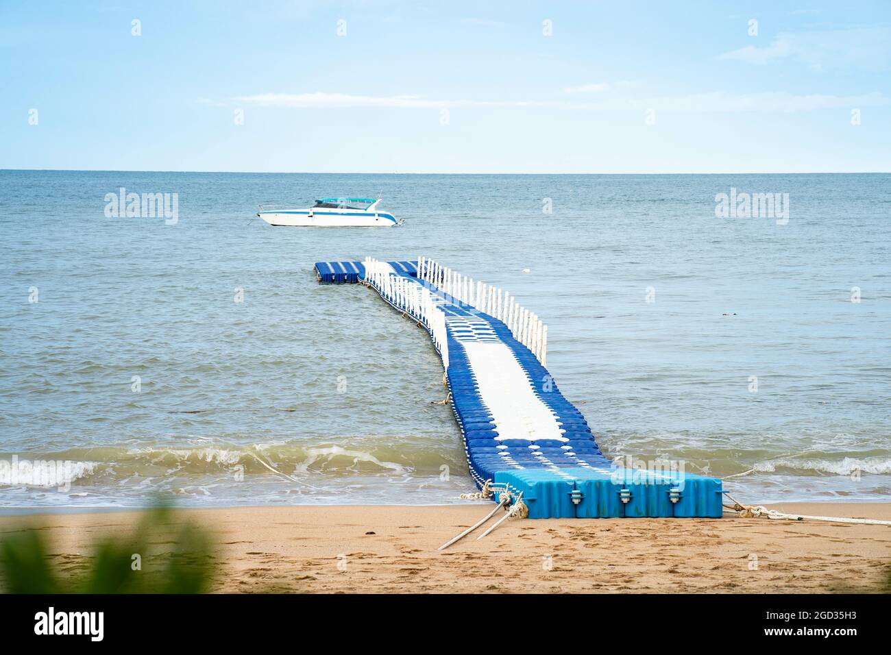 Cool water slide in the ocean on the sandy beach Stock Photo - Alamy
