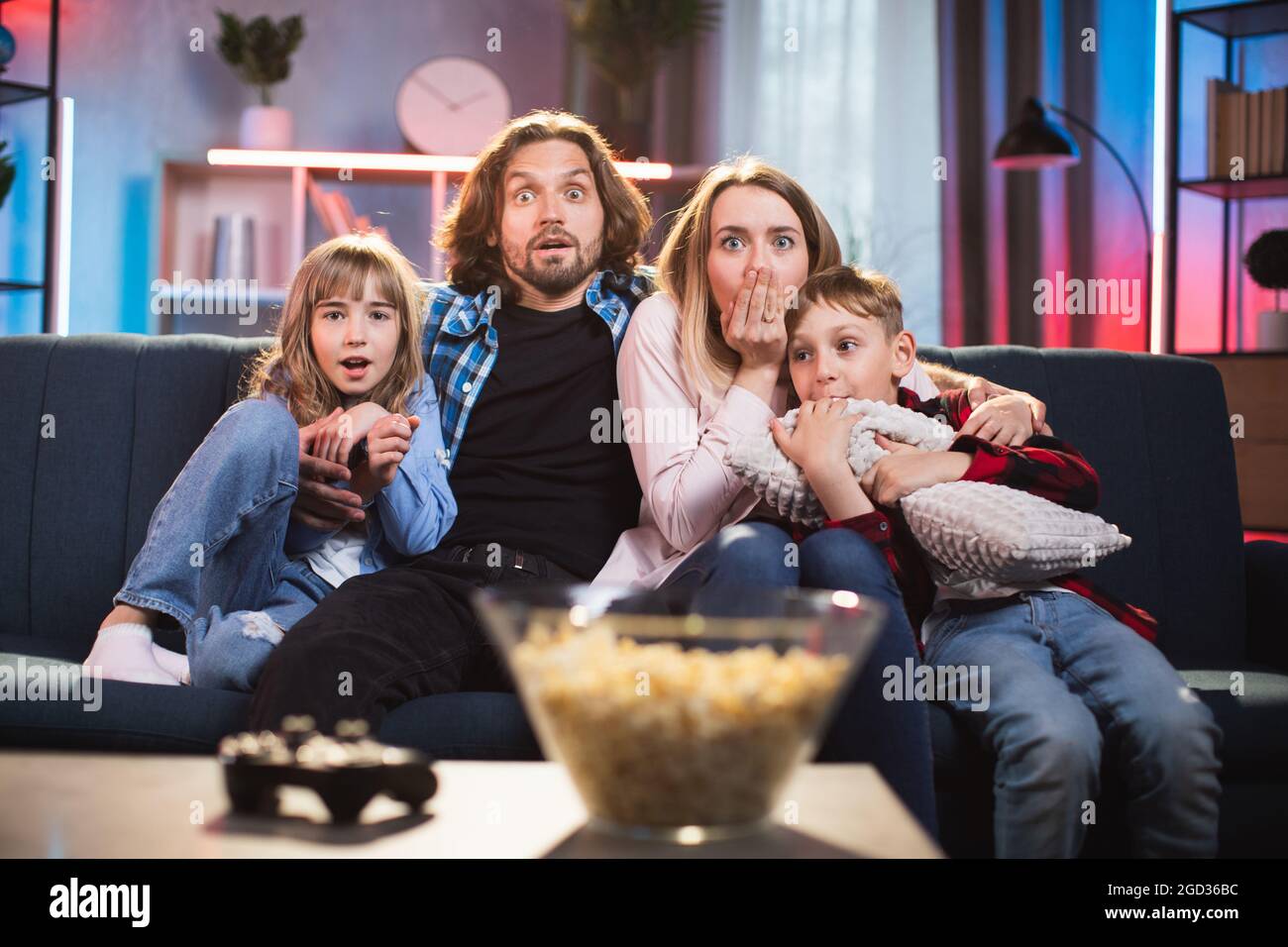 Scared children watching tv hi-res stock photography and images - Alamy
