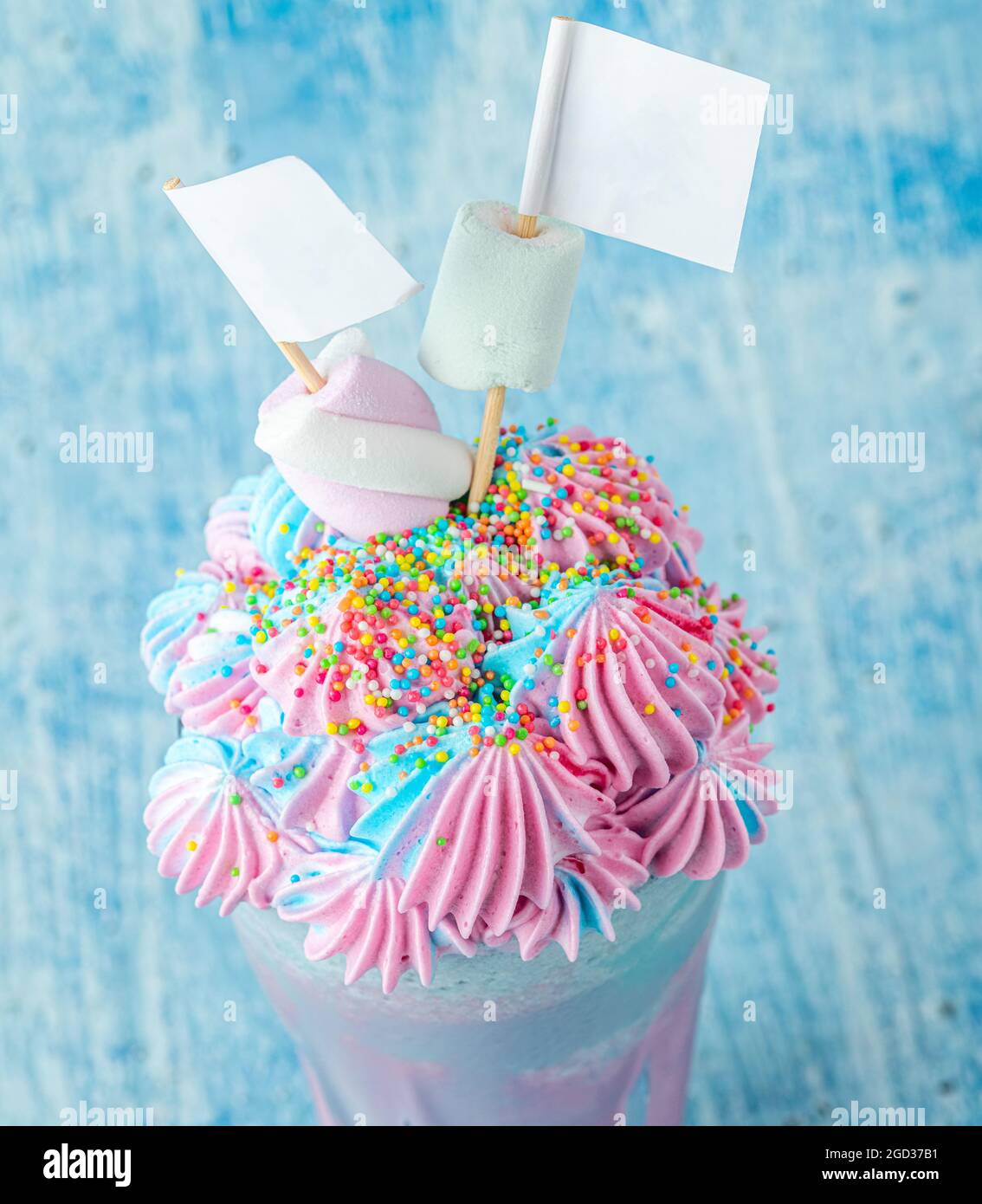 Glass pink milkshake decorated candy hi-res stock photography and ...