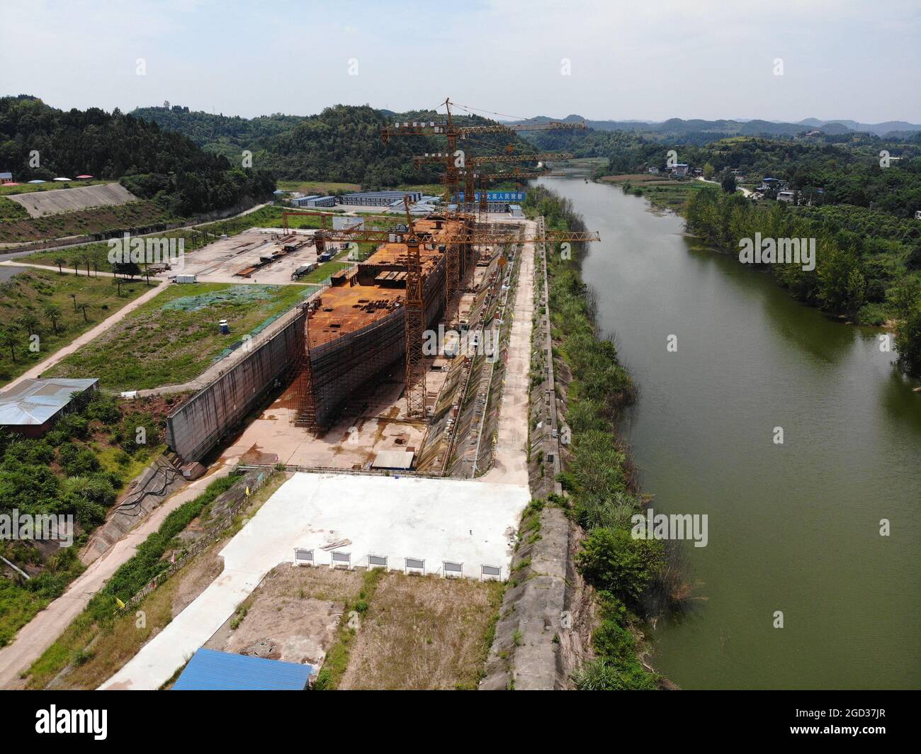 A 1:1 scale reconstruction of the "Titanic" lies quietly in the dock ...