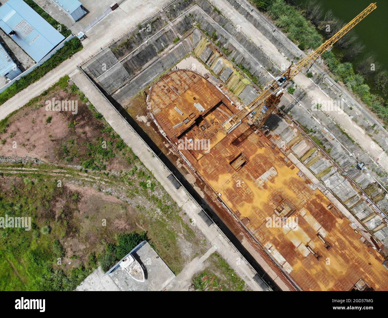 A 1:1 scale reconstruction of the "Titanic" lies quietly in the dock ...