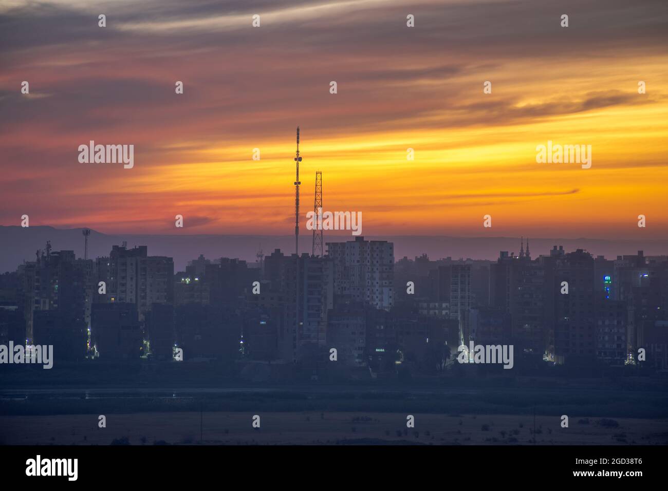 Sunset scene from Sohag city in south Egypt in a cloudy colorful ...