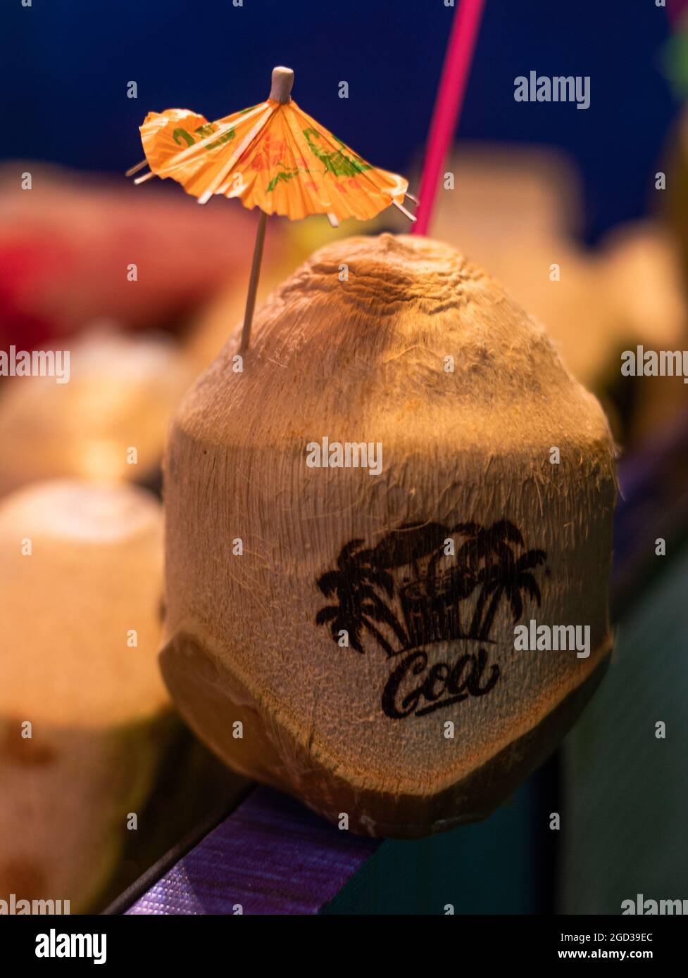 GOA, INDIA - Feb 06, 2019: A vertical shot of a tender coconut water ...