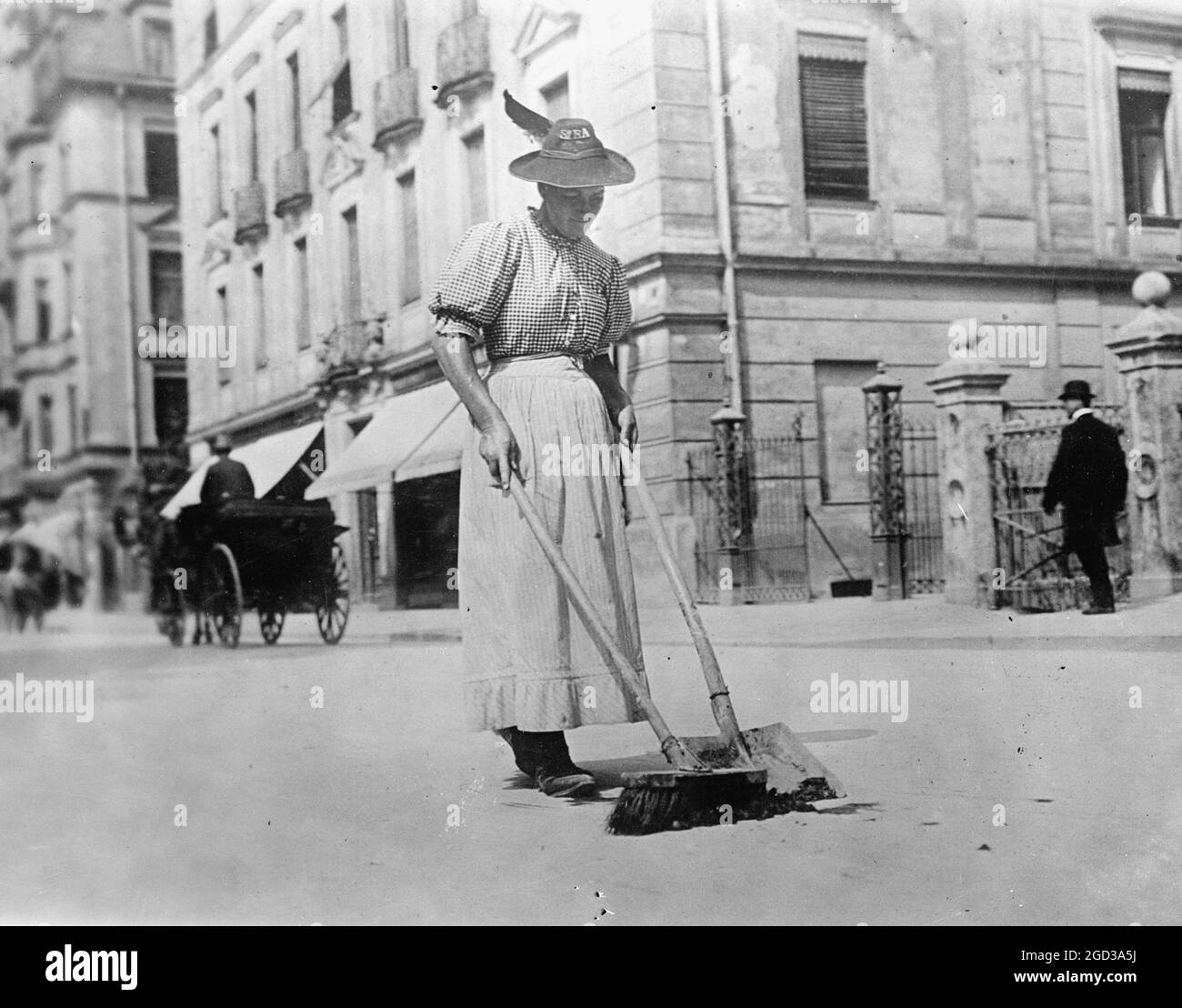 Archival woman street sweeper hi-res stock photography and images - Alamy