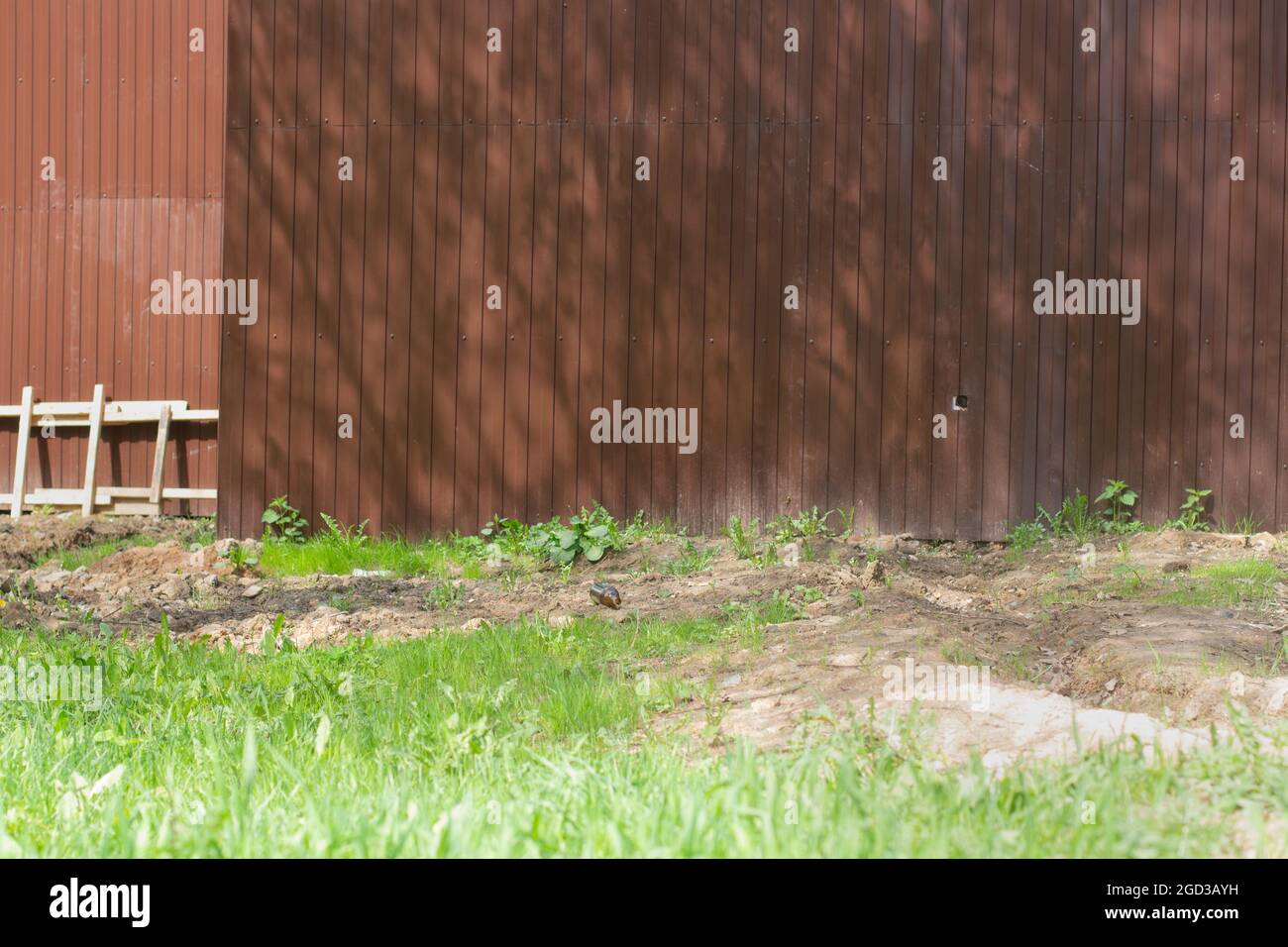 Material fencing. Wall surface. Fence on the street Stock Photo - Alamy