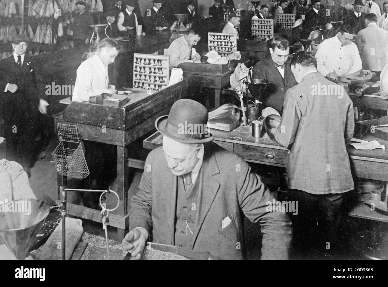 Agricultural Department grading samples in grain inspecting Office ca ...