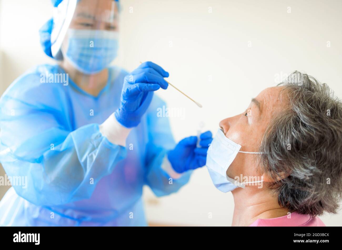 Scientist taking sample from tube hi-res stock photography and images ...